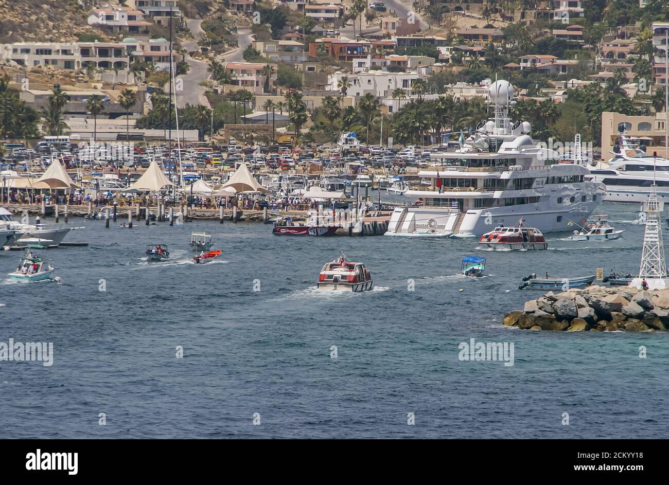 Cabo San Lucas, Mexico - April 22, 2008: Yacht harbor with one super ...