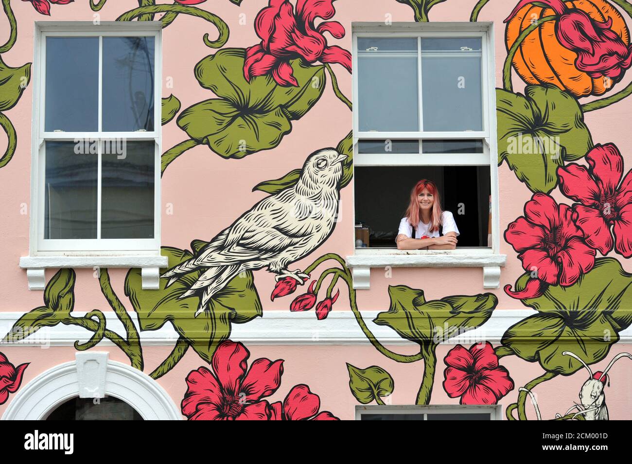 Artist Alex Lucas from Bristol with the house she painted in Cheltenham ...