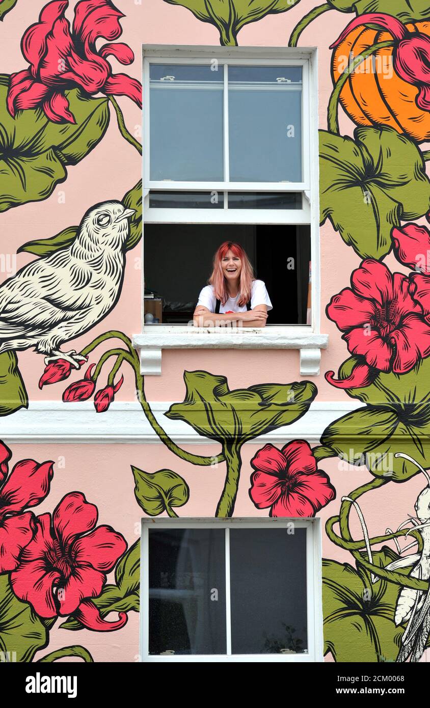 Artist Alex Lucas from Bristol with the house she painted in Cheltenham ...