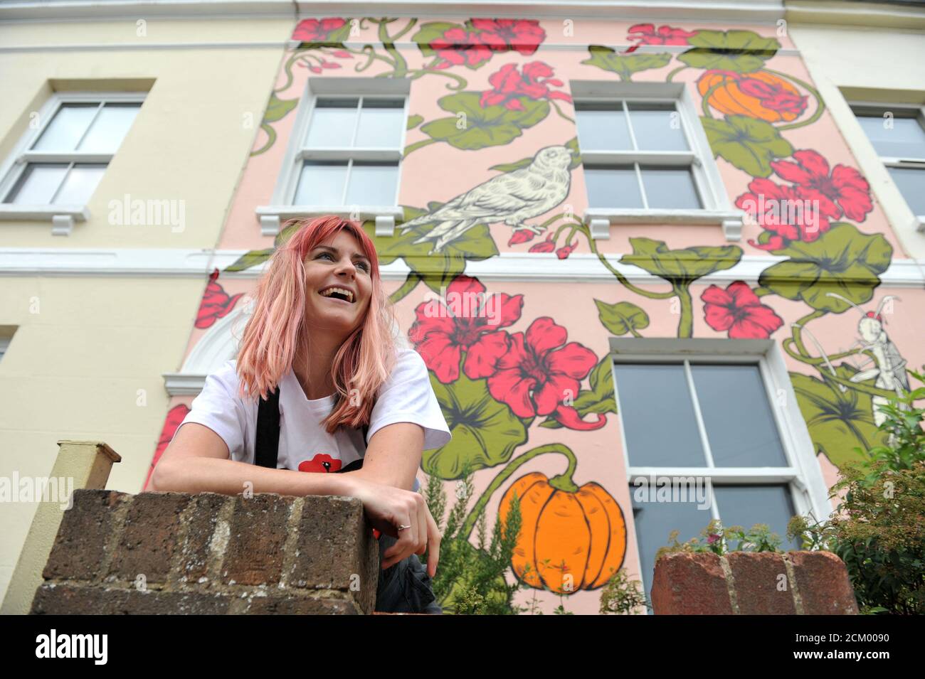 Artist Alex Lucas from Bristol with the house she painted in Cheltenham ...