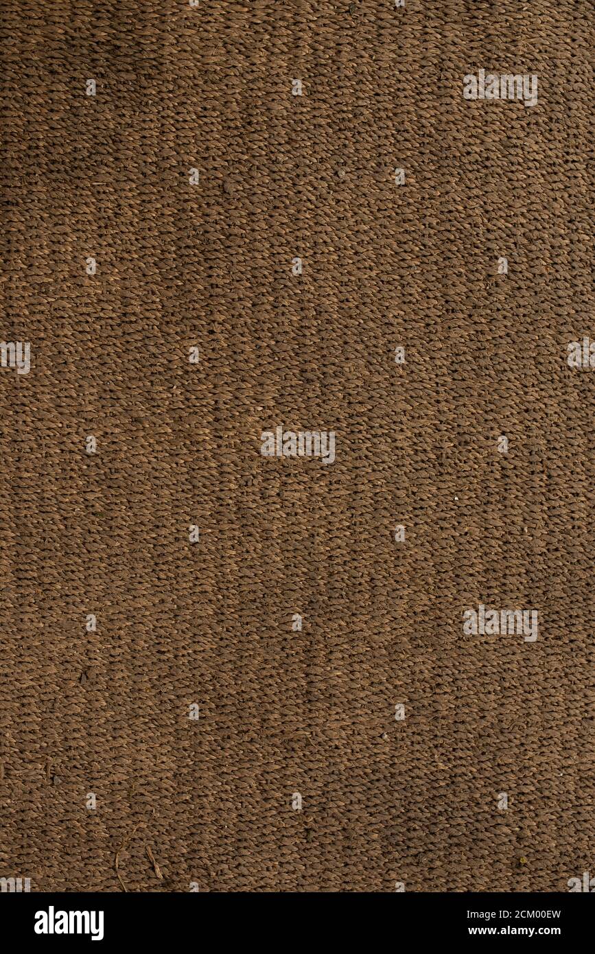 dense floor rug with granular texture of orange color Stock Photo - Alamy