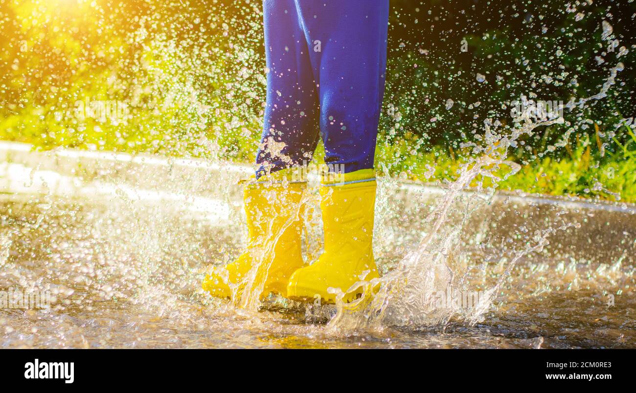 Wet rain puddles water shoes hi-res stock photography and images - Alamy