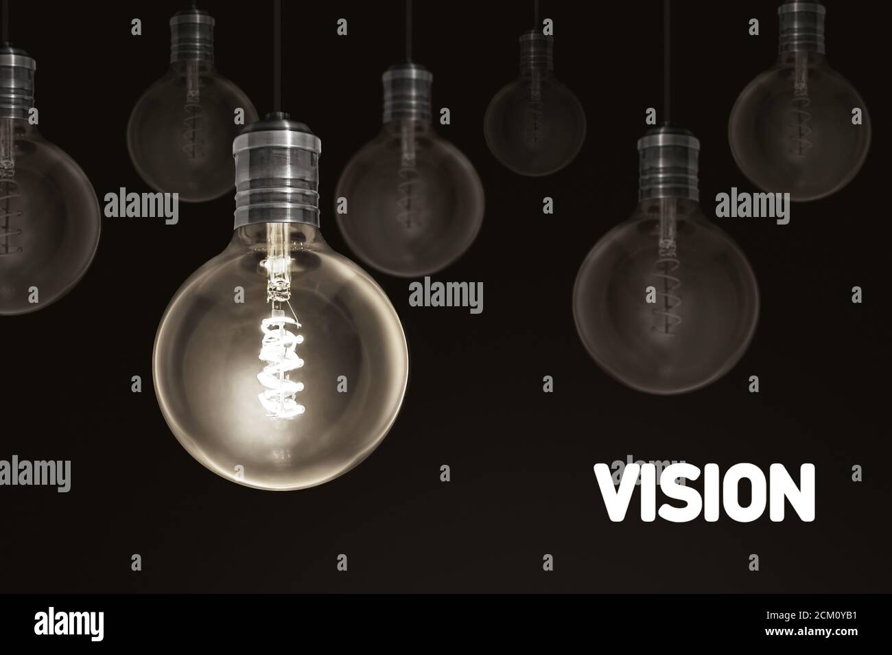 Vision , creativity innovation illuminated light bulb row dim ones ...