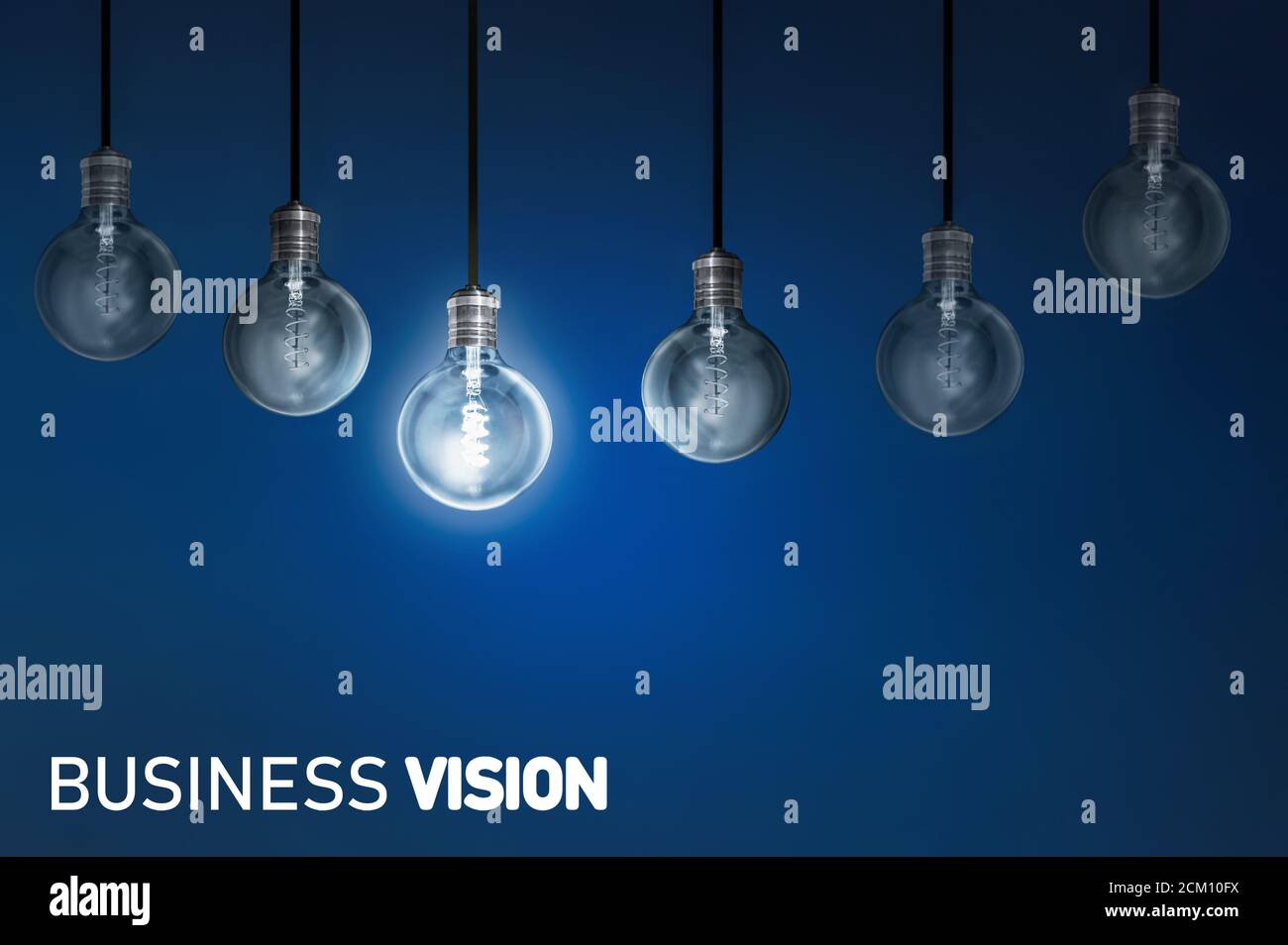 Business Vision , creativity innovation illuminated light bulb row dim ...