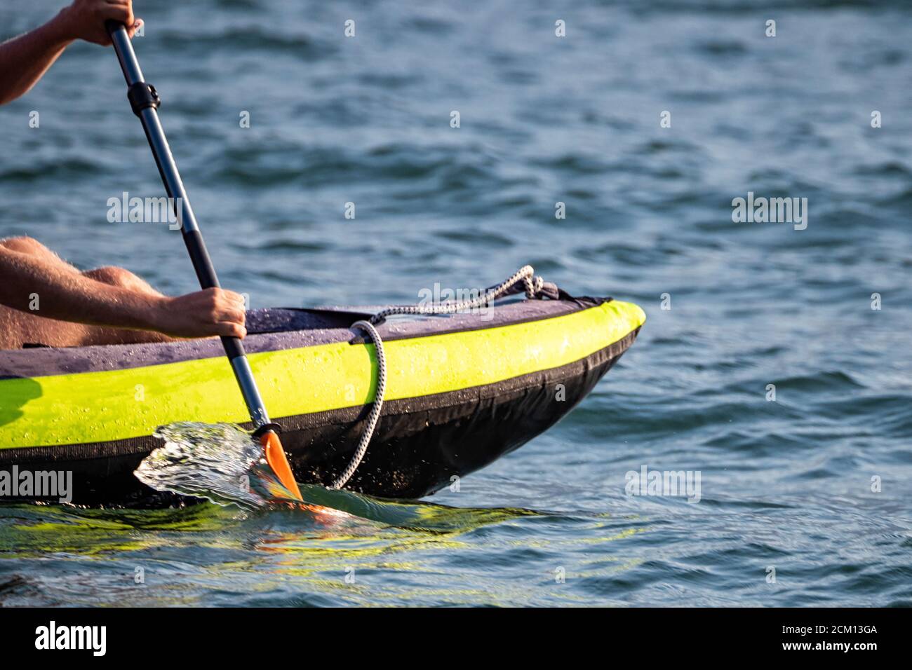 Canoeing scene on Lake Como Stock Photo - Alamy