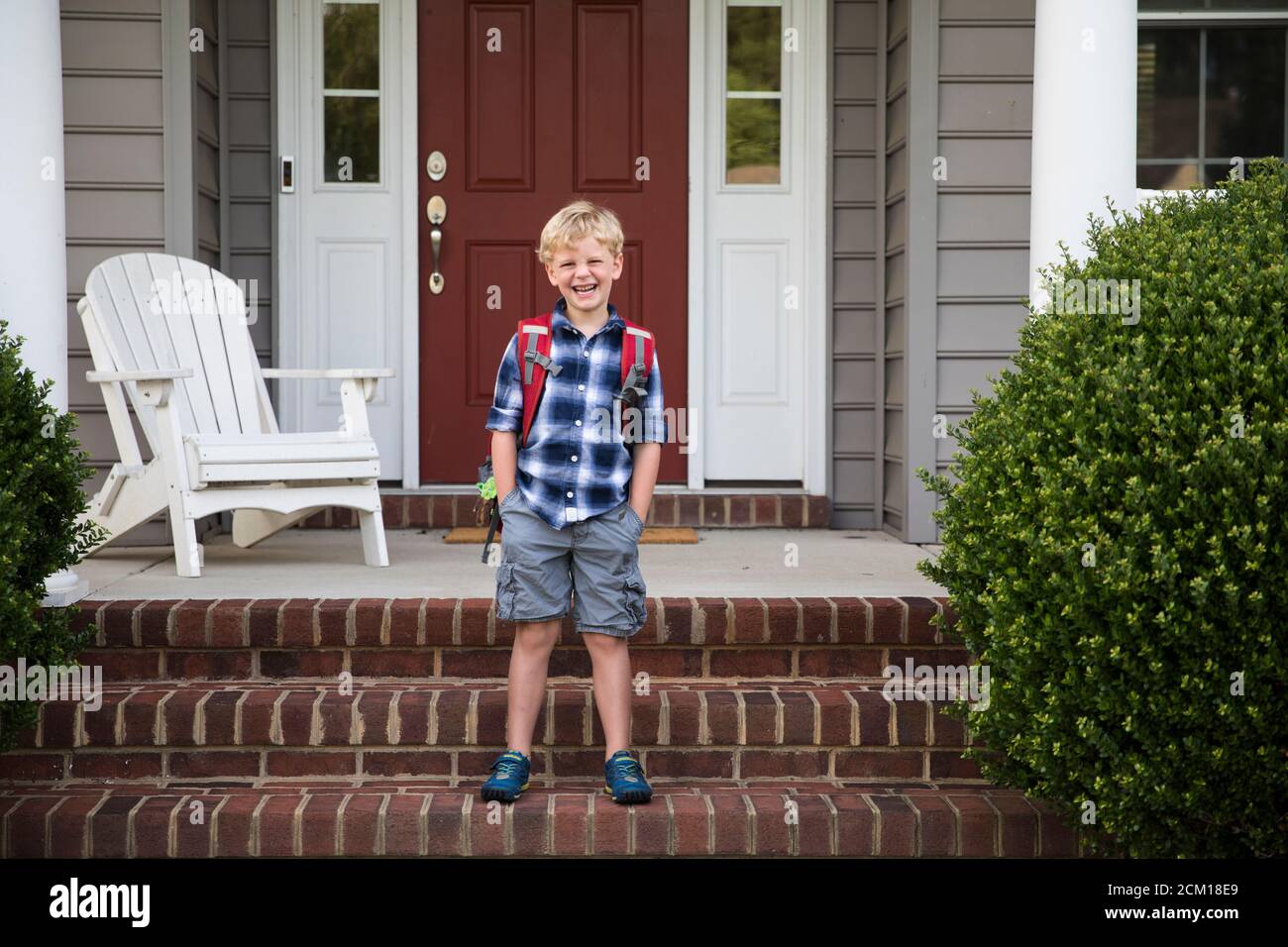 Grinning boy hi-res stock photography and images - Alamy