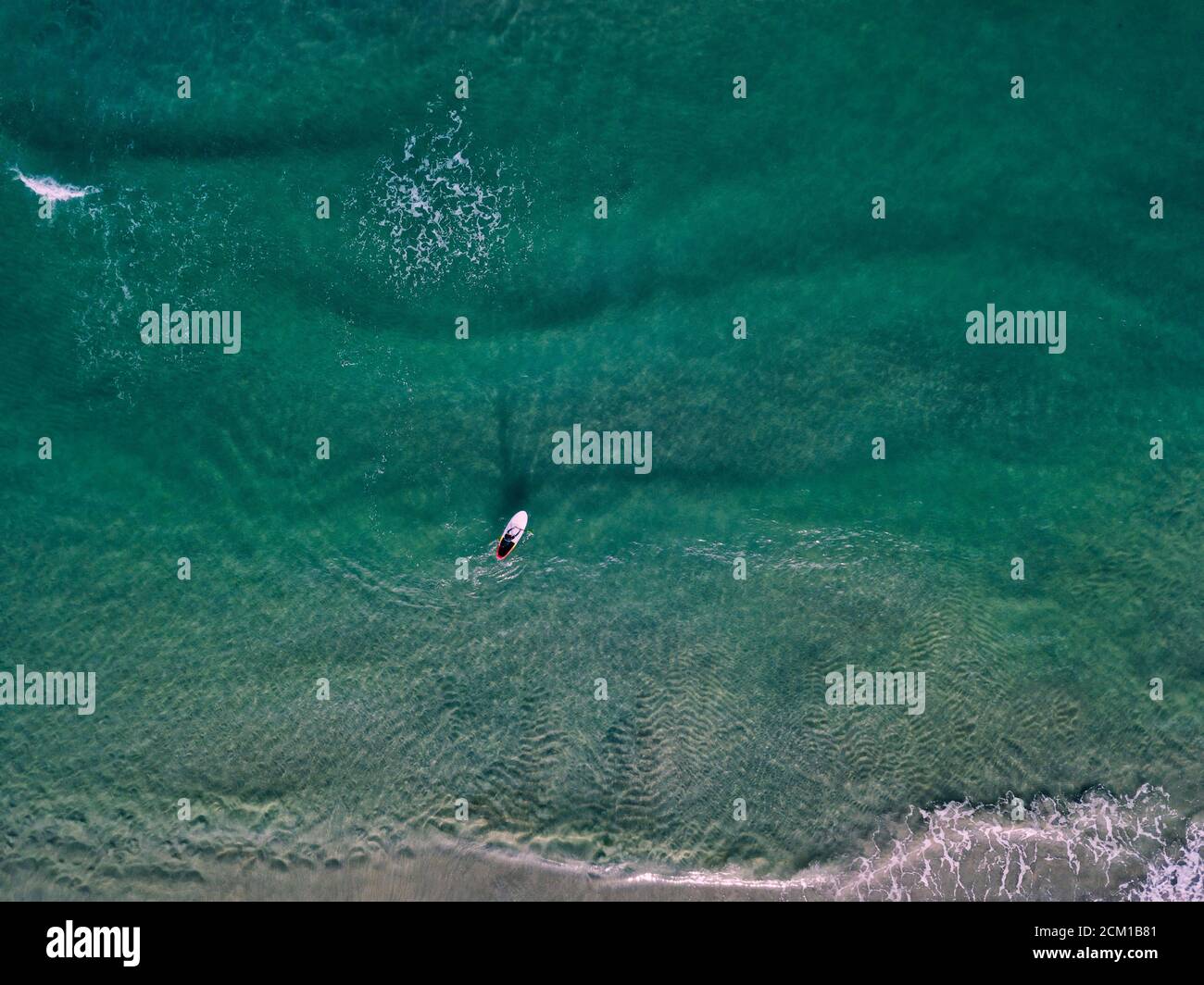 Aerial surfer man woman sup hi-res stock photography and images - Alamy