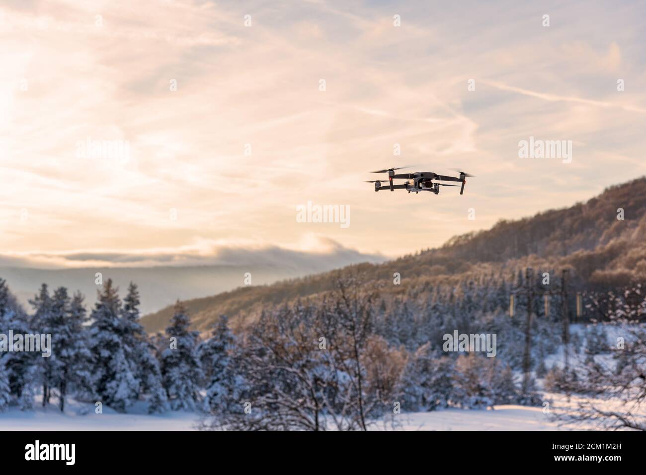 drone flying at dusk in winter Stock Photo - Alamy