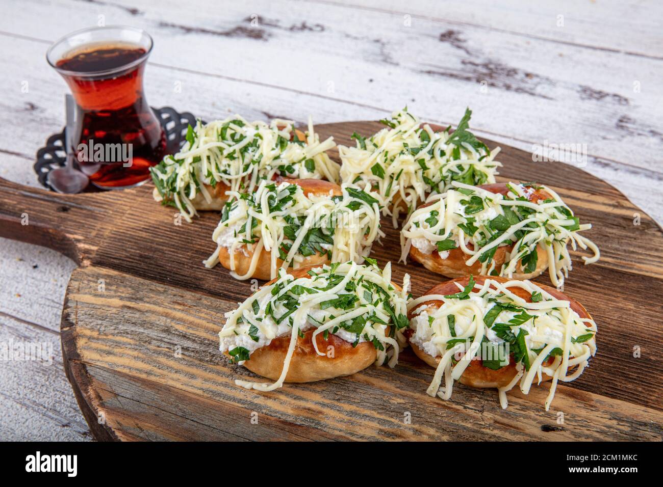 Traditional Turkish pastry pogaca with cheese filling with dill ...