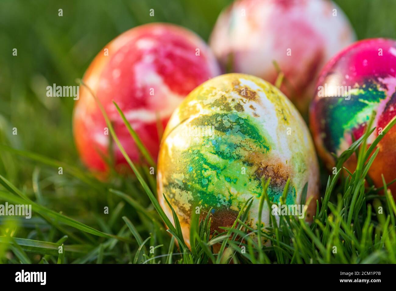 Colorful easter eggs for easter in the grass Stock Photo - Alamy