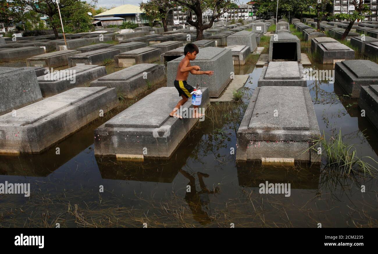 Flooded cemetery hi-res stock photography and images - Alamy