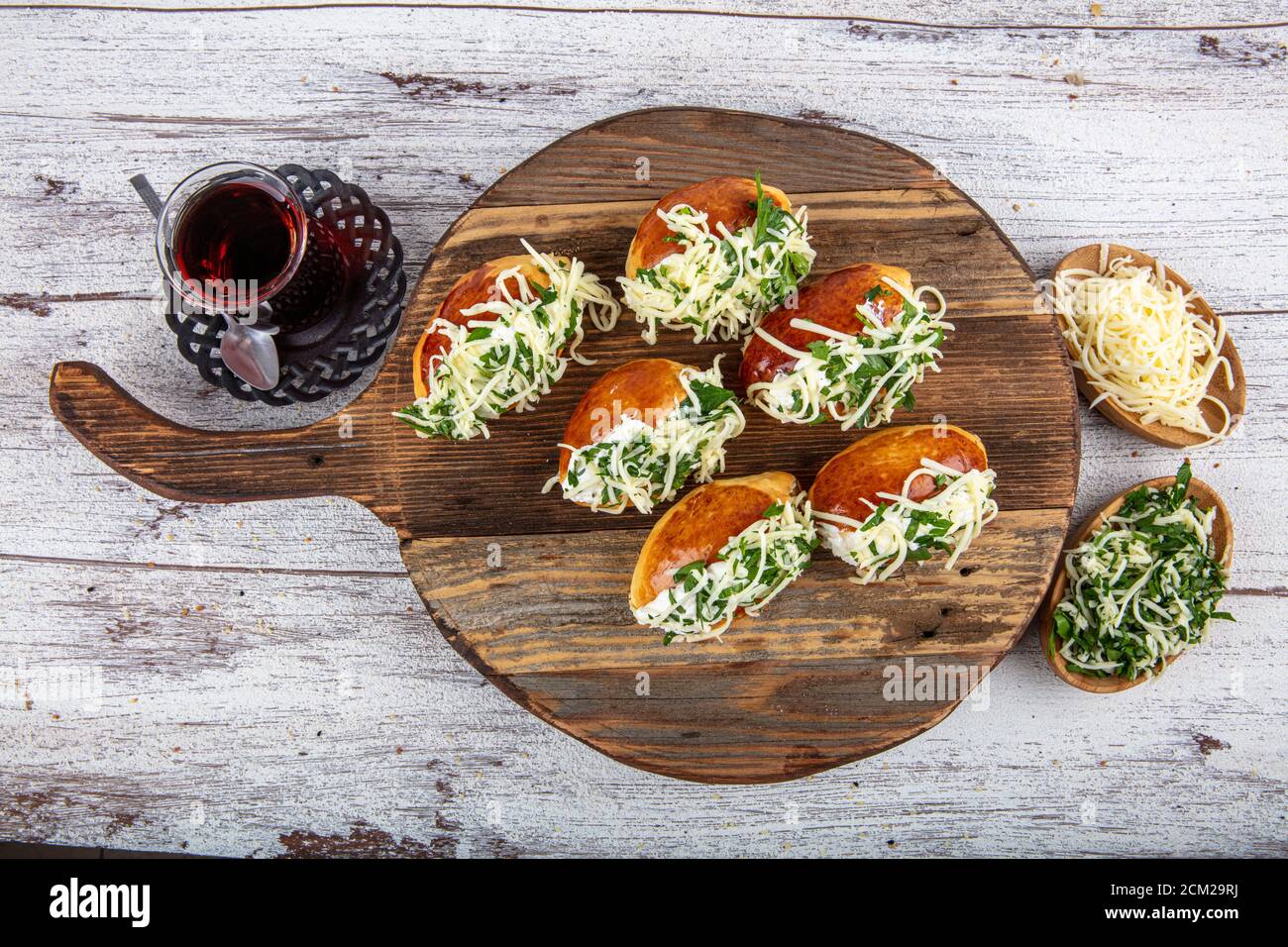 Traditional Turkish pastry pogaca with cheese filling with dill ...