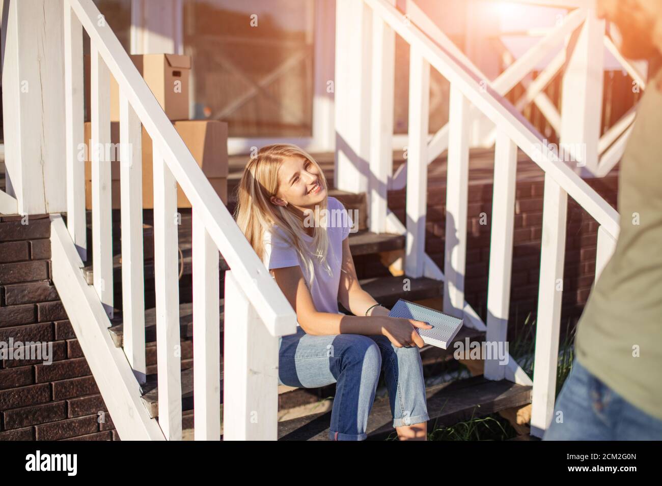 our first home swith new home owners on step Stock Photo - Alamy