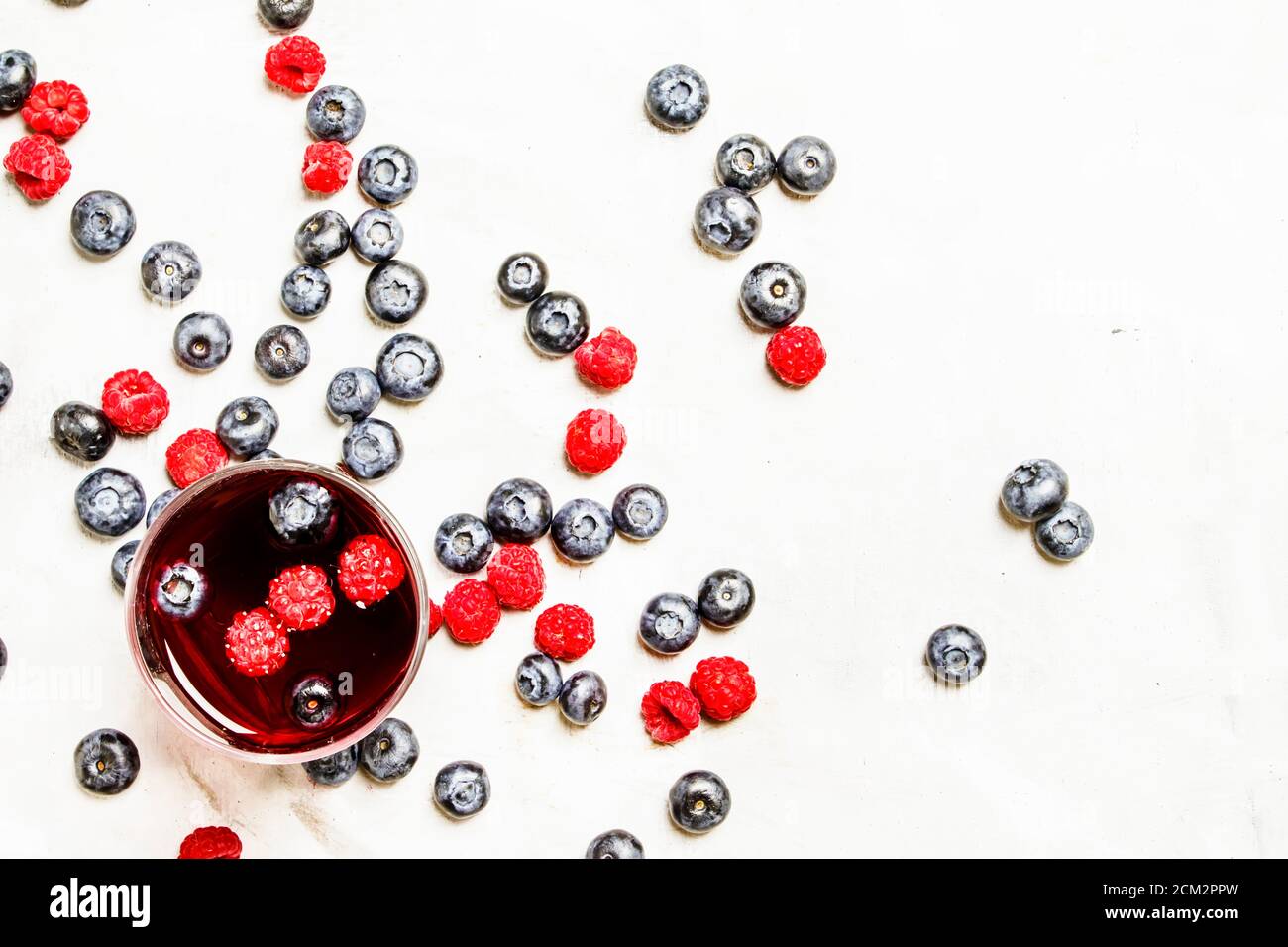 Summer red berry drink with blueberry and raspberry, top view Stock ...