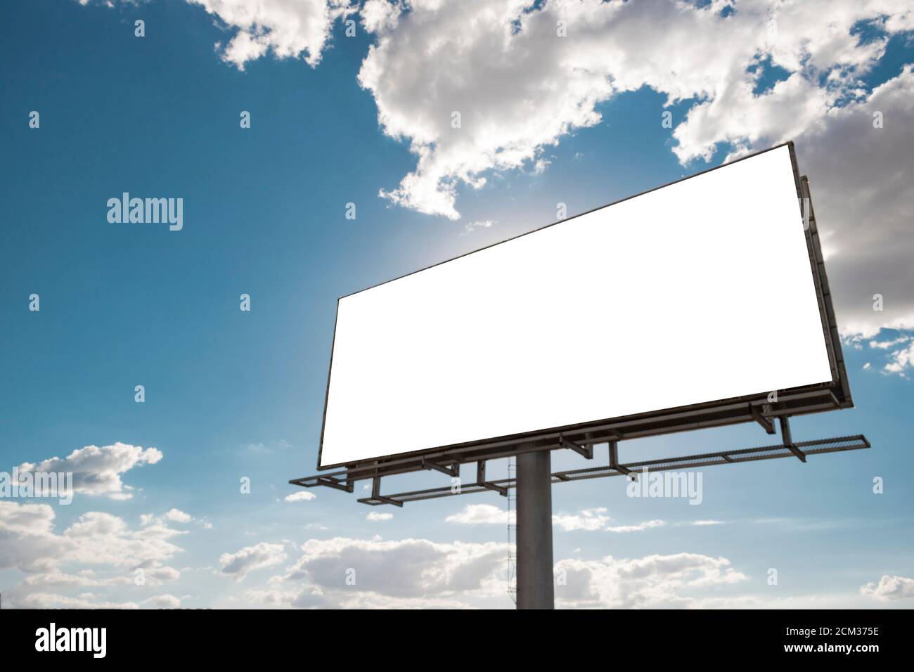 Billboard - Empty billboard in front of beautiful cloudy sky in a rural ...