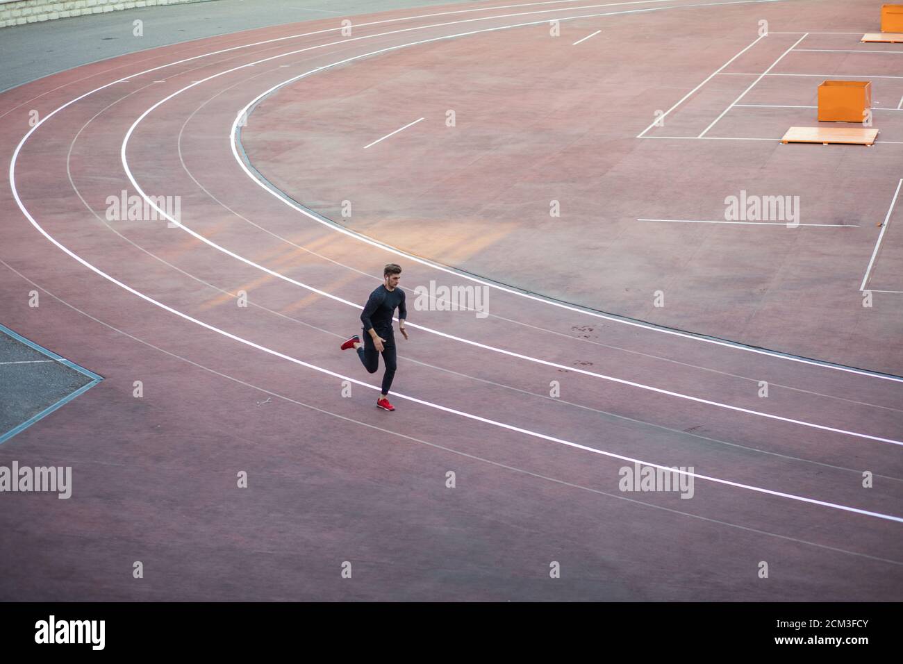 Top high angle view Athlete running on running track. Runner sprinting ...