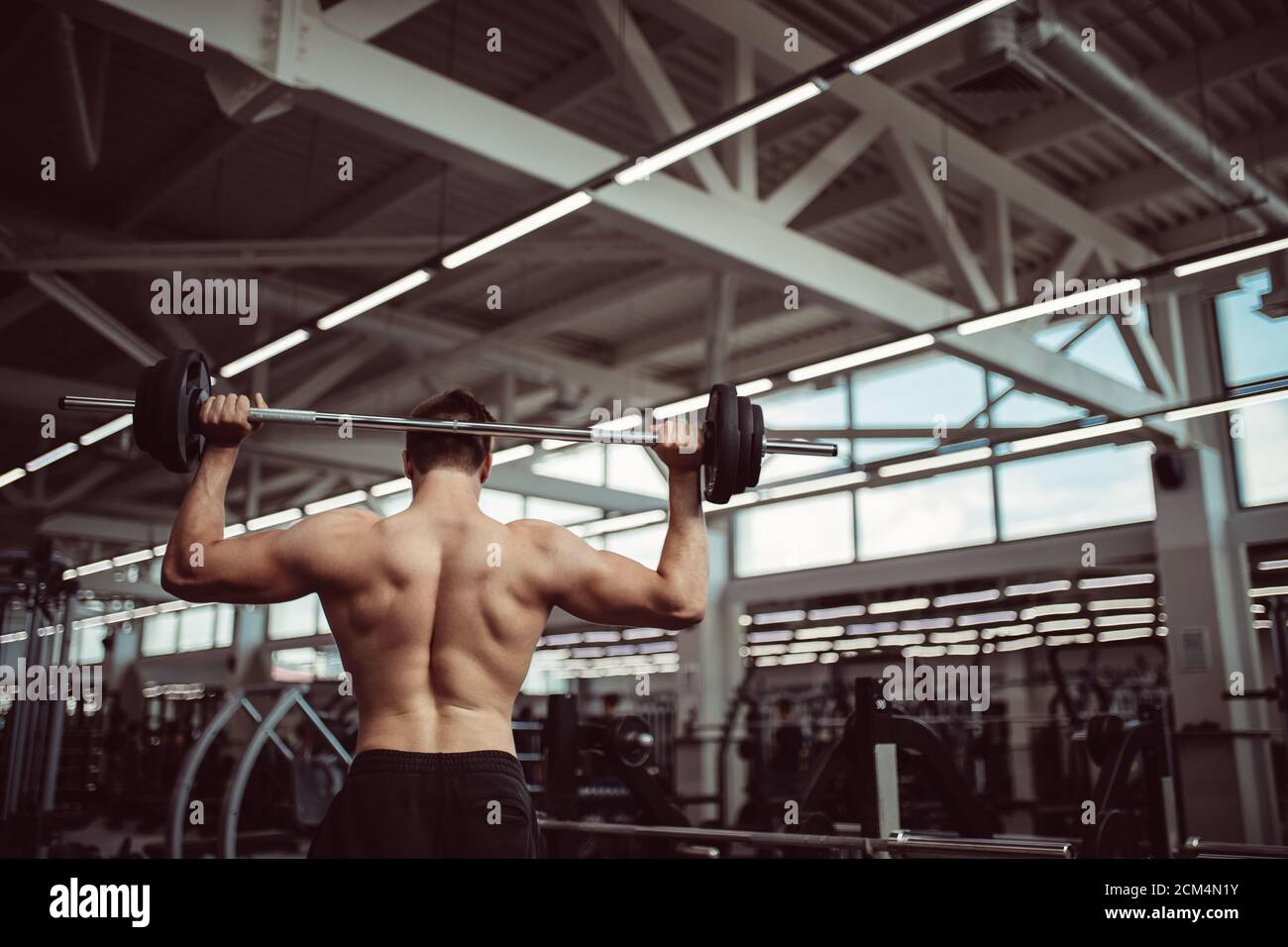 Rear view back muscles bodybuilder hi-res stock photography and images ...