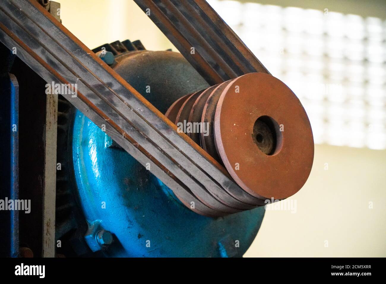 Belt drive with pulley and motor Stock Photo - Alamy