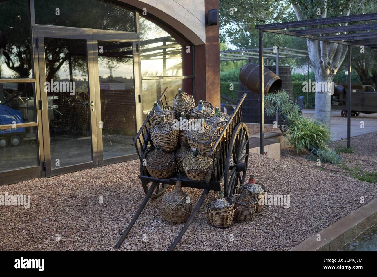 Wagon full of wicker baskets outside a building Stock Photo - Alamy