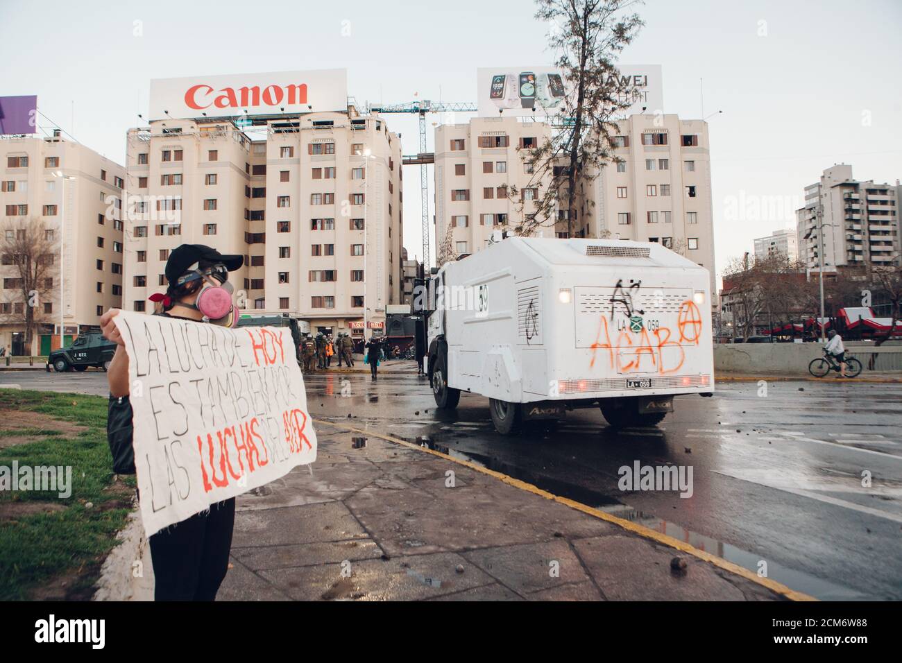 SANTIAGO, CHILE - SEPTEMBER 11, 2020 - A young woman protests with a ...