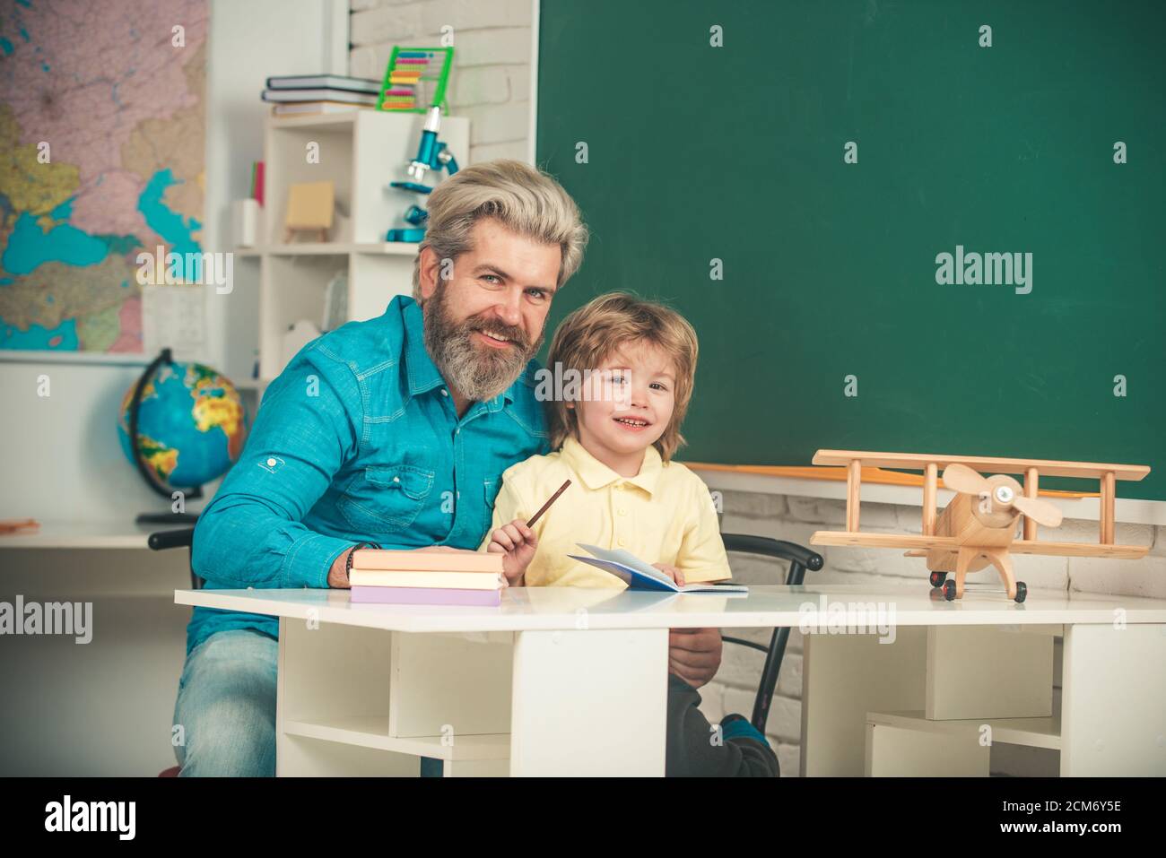 Individual tutoring. Educational process. Little ready to study ...