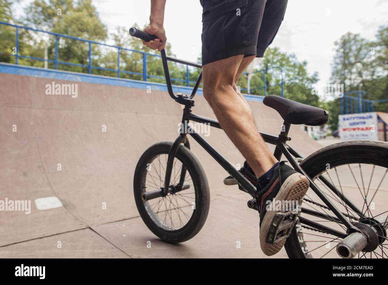 close up Boy riding bmx in a skate park. Beautiful background Stock ...