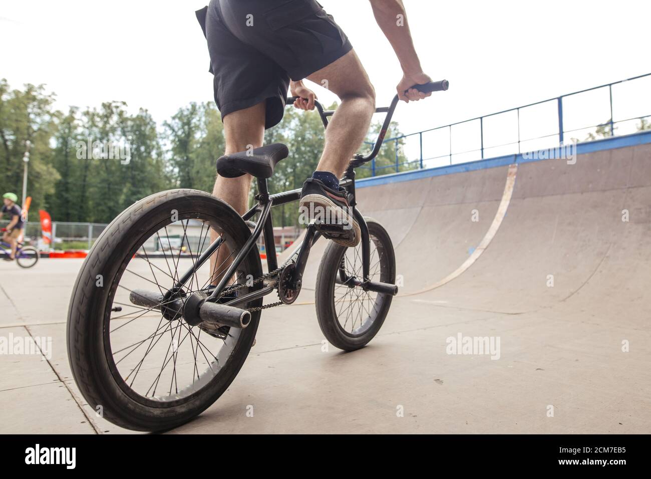 close up Boy riding bmx in a skate park. Beautiful background Stock ...