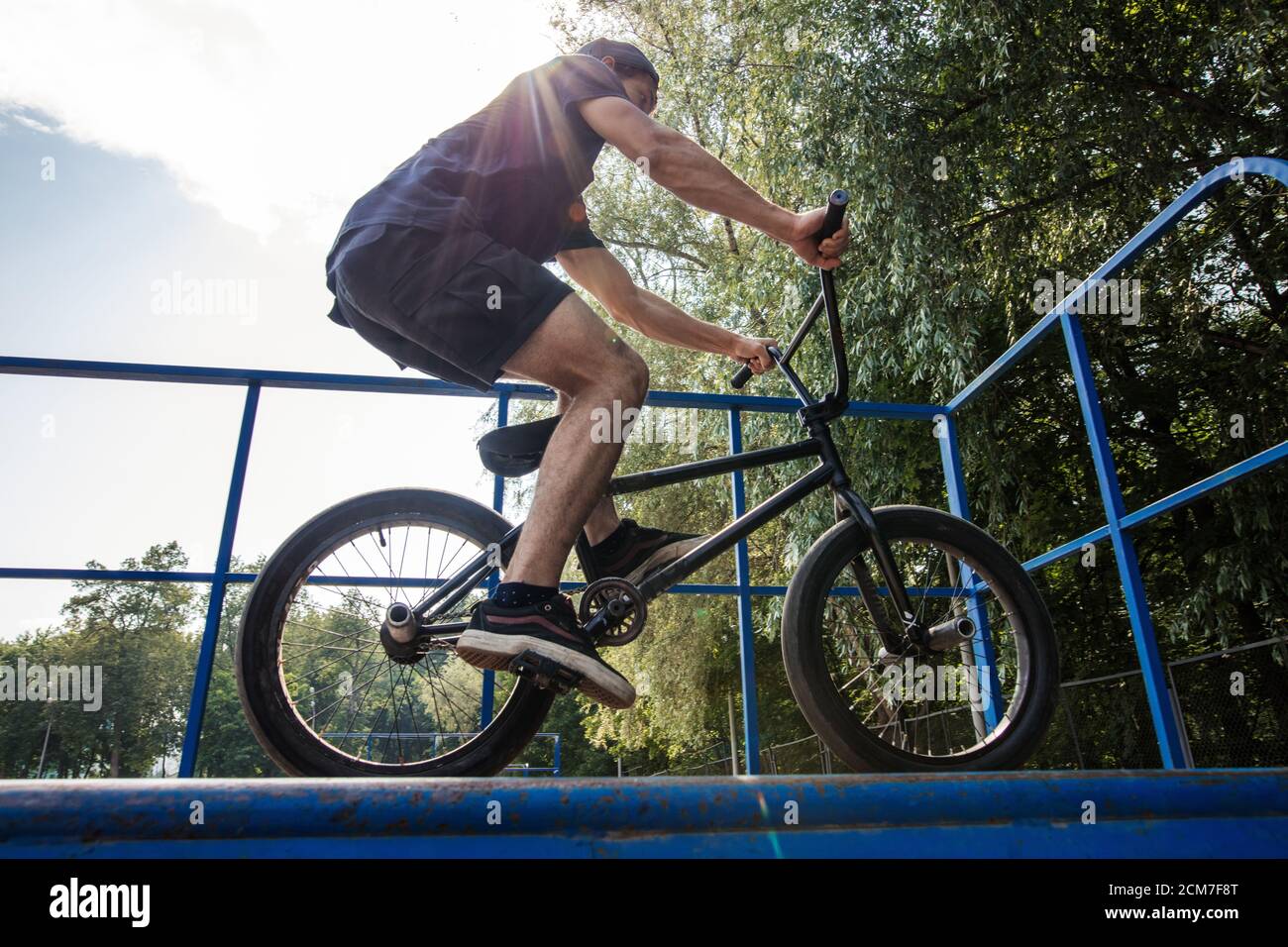 Bmx Biker In Skate Park In Open Air People Skills With Special Bike