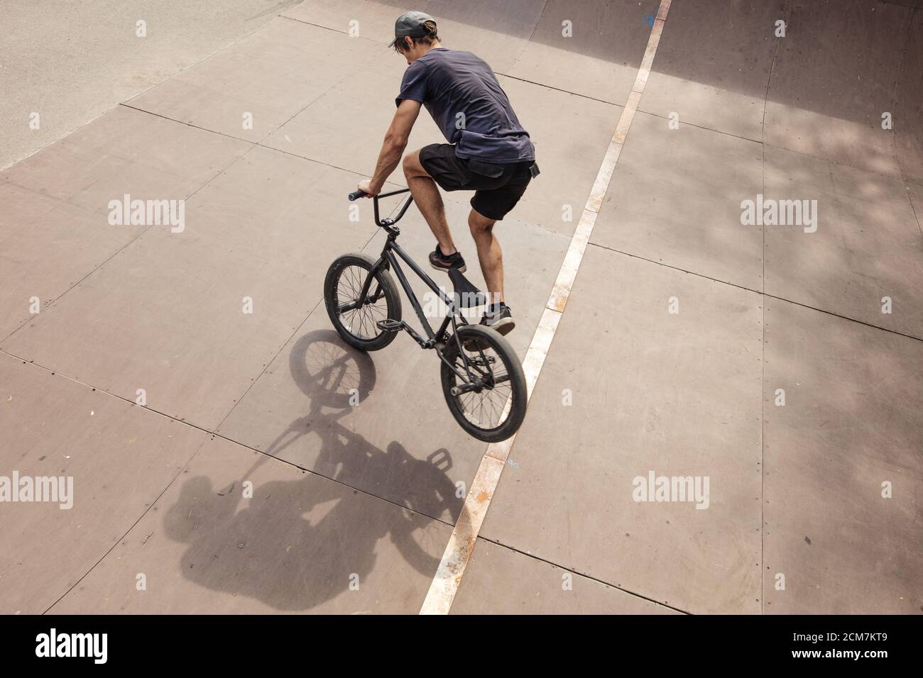 Extreme bicycle rider performing freestyle tricks on bike Stock Photo ...