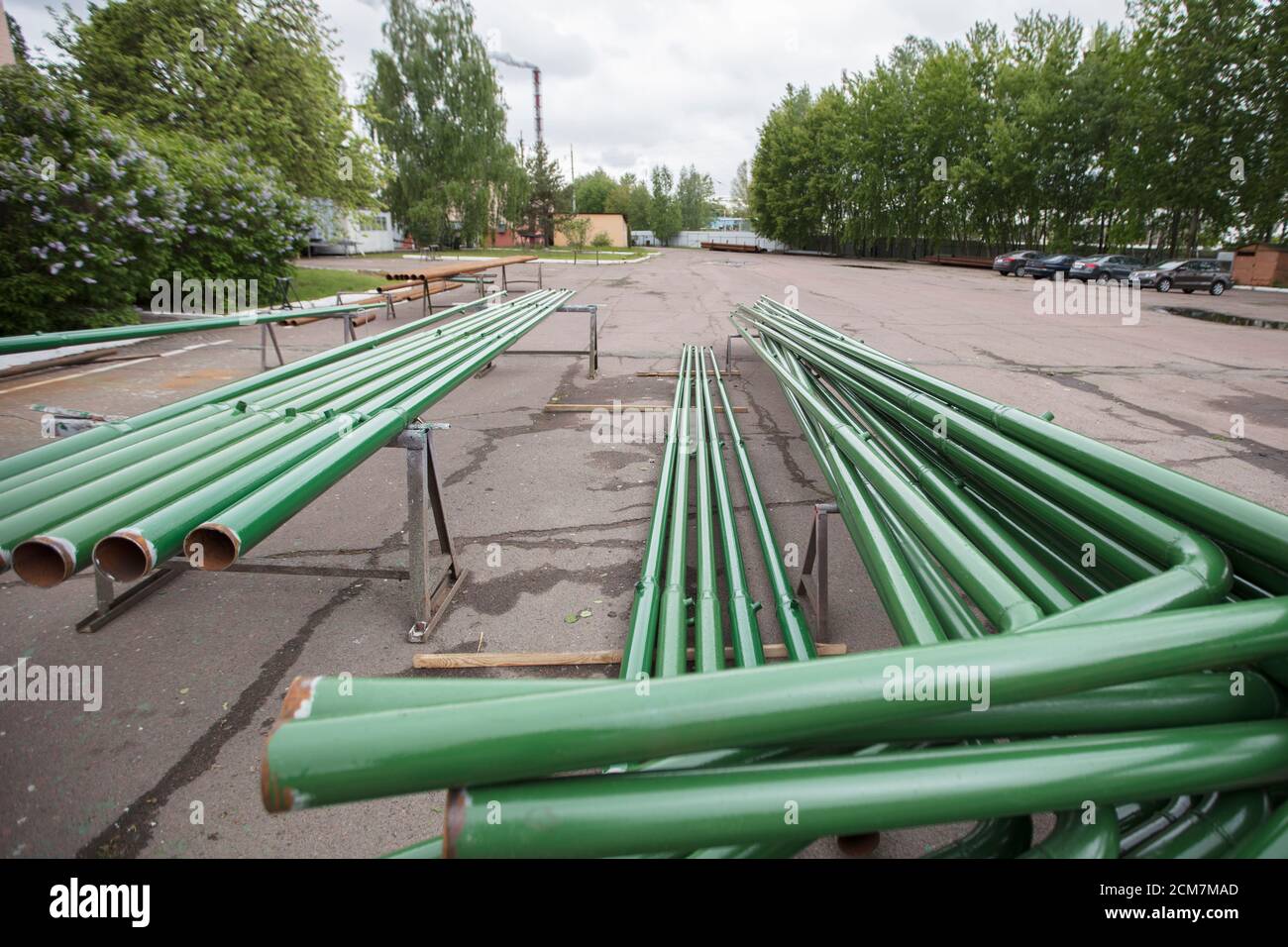 Metal pipes at the industrial site of the plant Stock Photo - Alamy