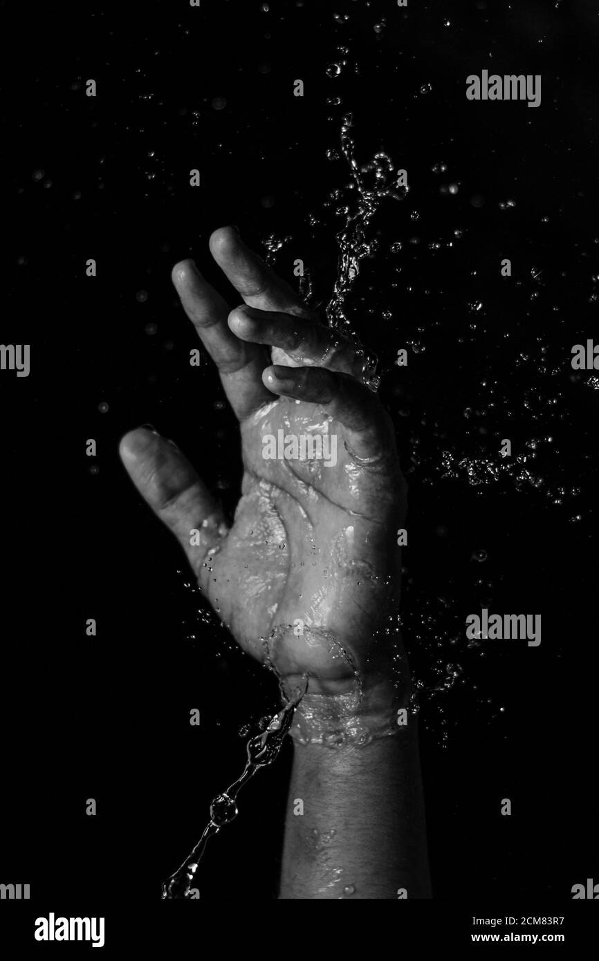 Dark hand hi-res stock photography and images - Alamy