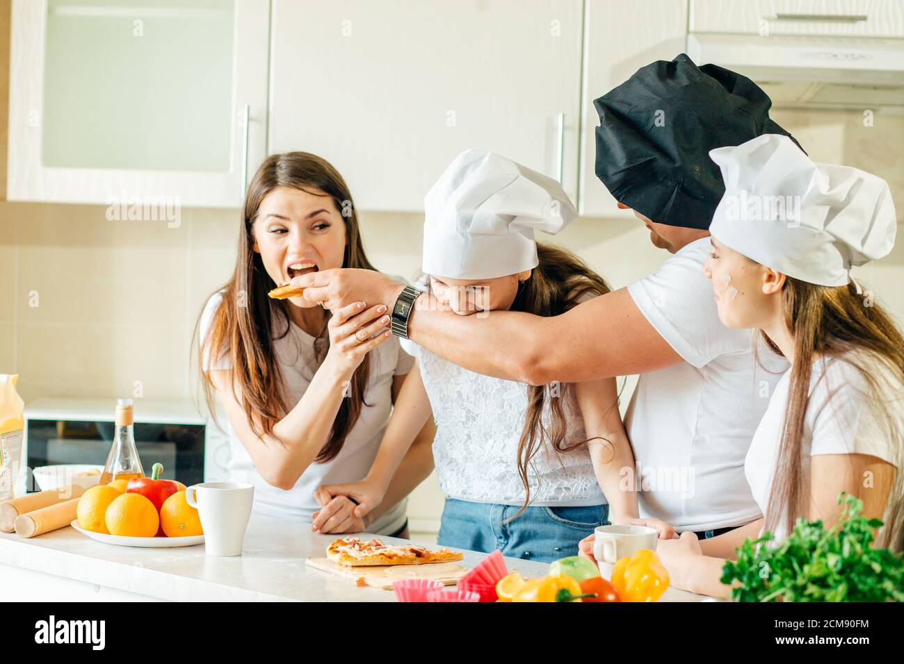 Mother daughter making pizza home hi-res stock photography and images ...