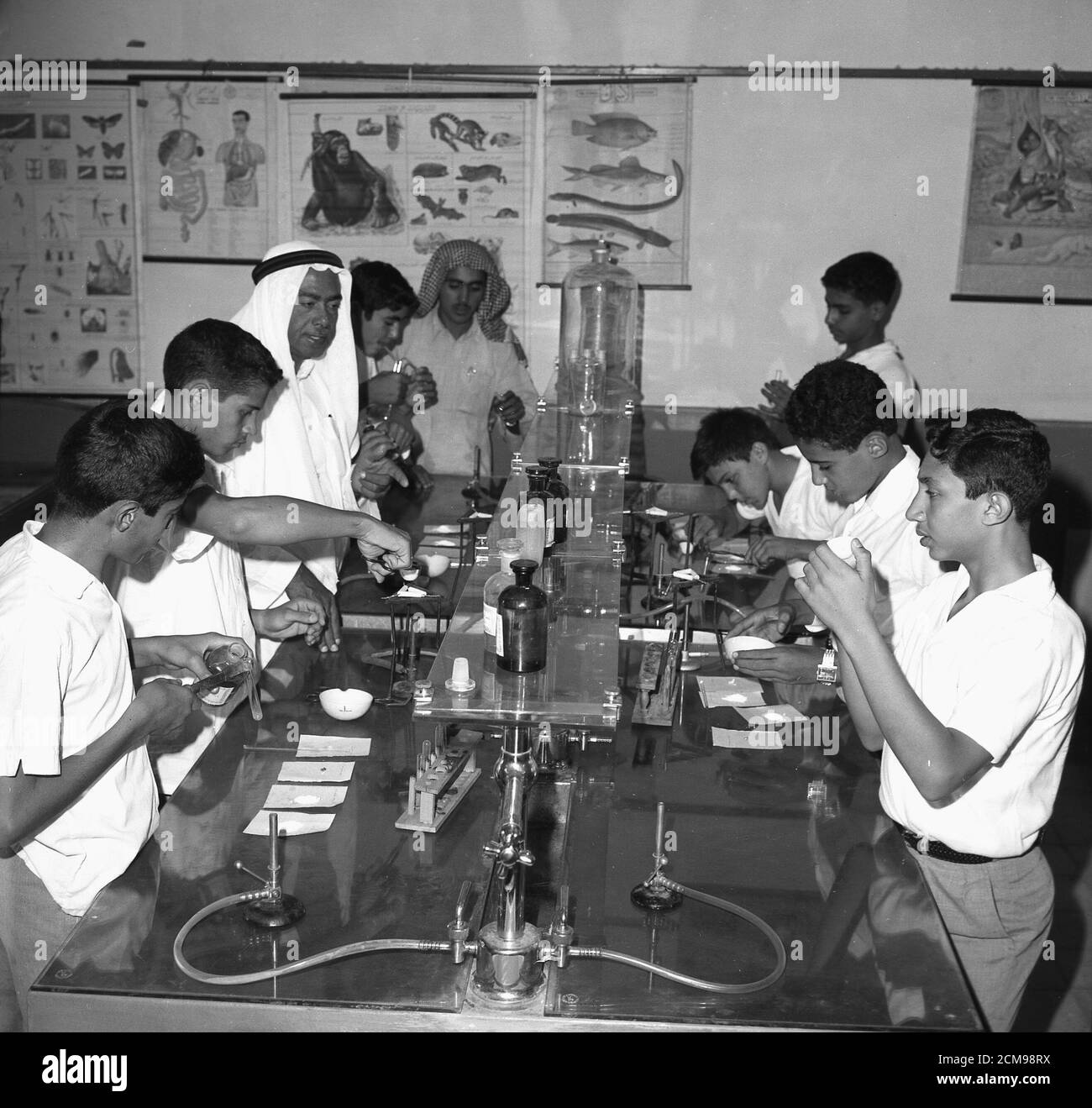 1960s, historical, male pupils in a science laboratory at a secondary ...