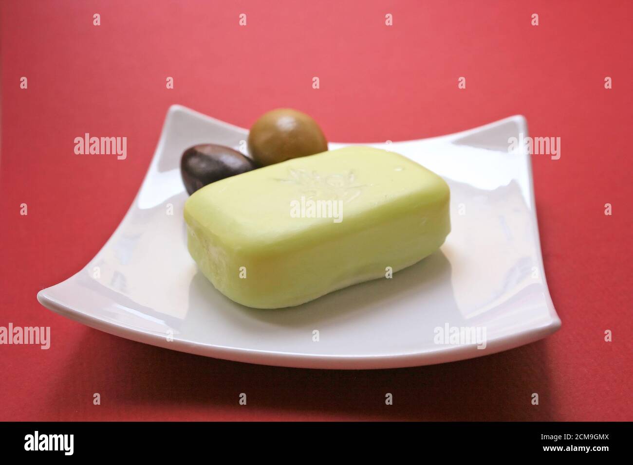 Olive shell hi-res stock photography and images - Alamy