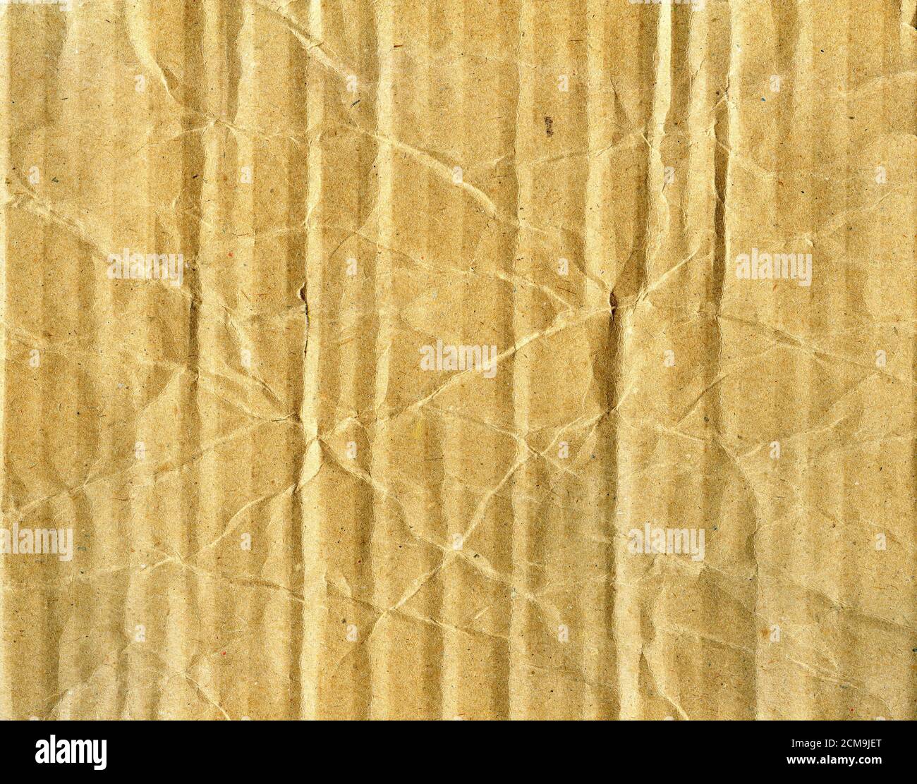 Textured corrugated cardboard with natural fiber parts Stock Photo - Alamy