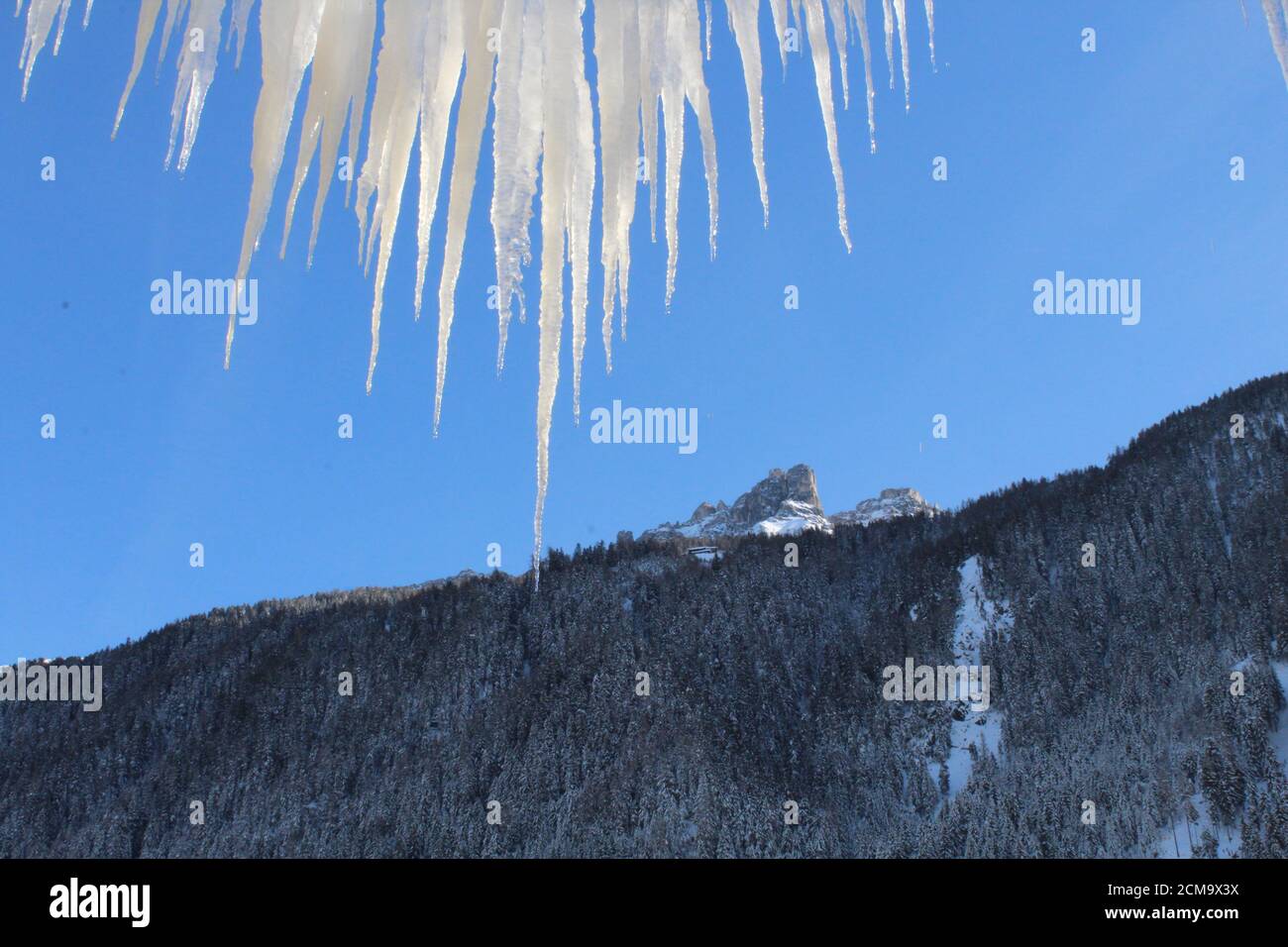 Icicles in front of the alpine landscape of the Stubai Valley, Tyrol ...