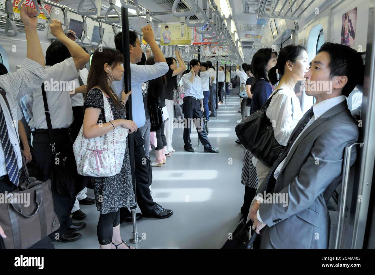 PEOPLE INSIDE A SUBWAY CAR Stock Photo - Alamy