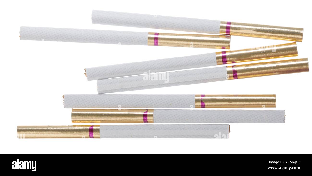 Bunch of unlit cigarettes isolated on white Stock Photo - Alamy