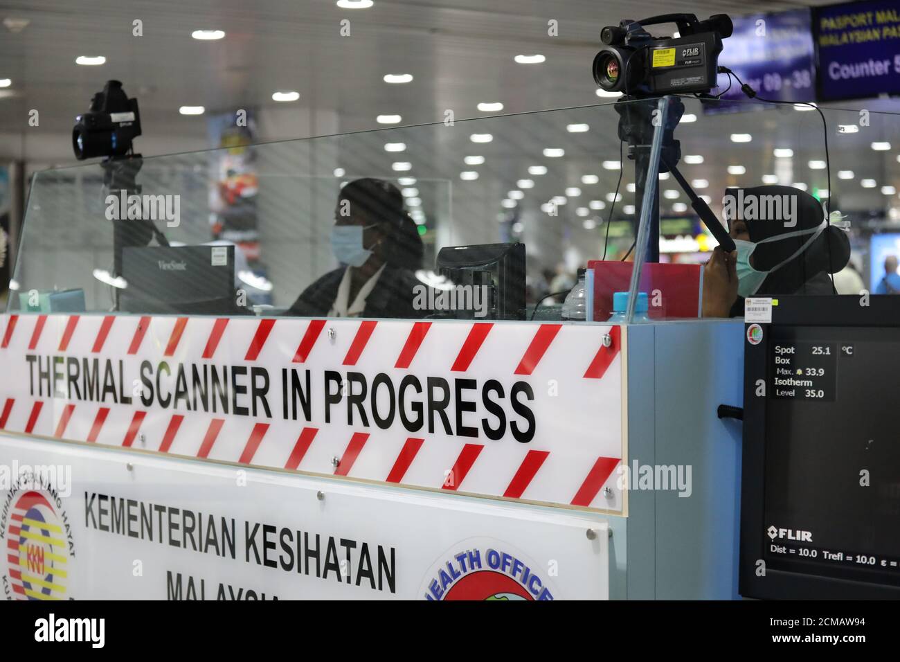 Airport quarantine officers hi-res stock photography and images - Alamy