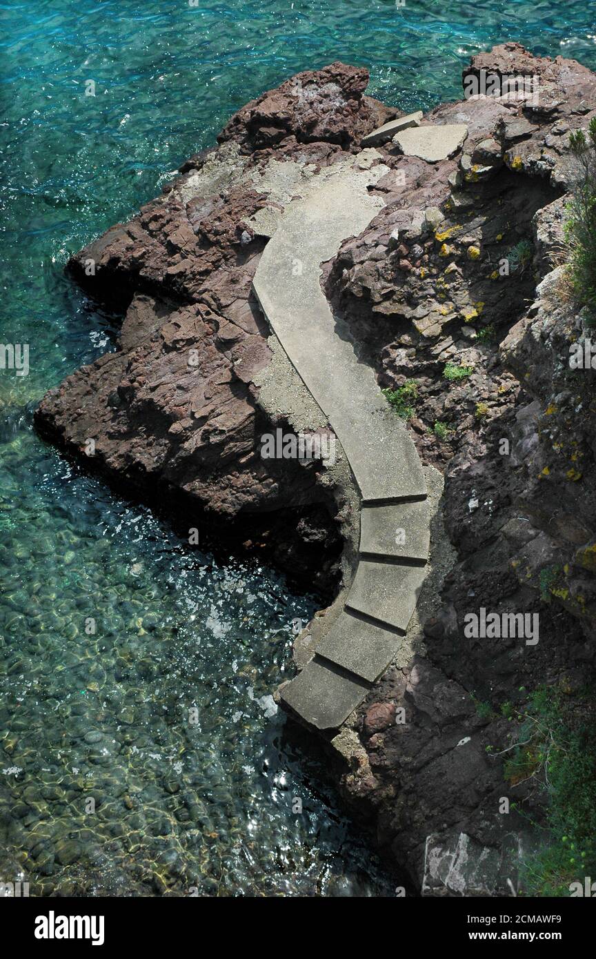 Secluded man made path to the sea suitable for boat docking or swimming ...