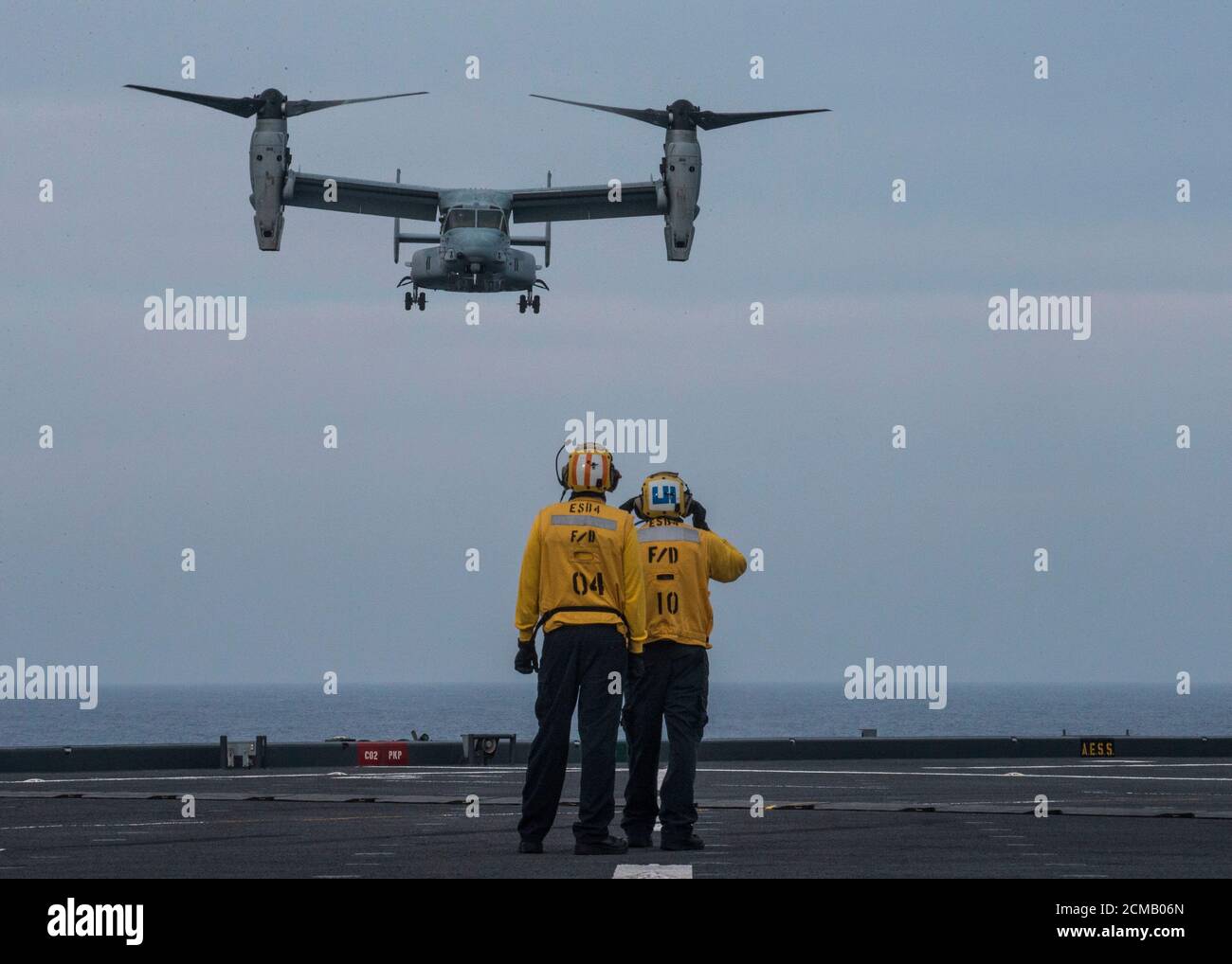 U.S. Marines with VMM-263 and Sailors aboard the Expeditionary Sea Base ...