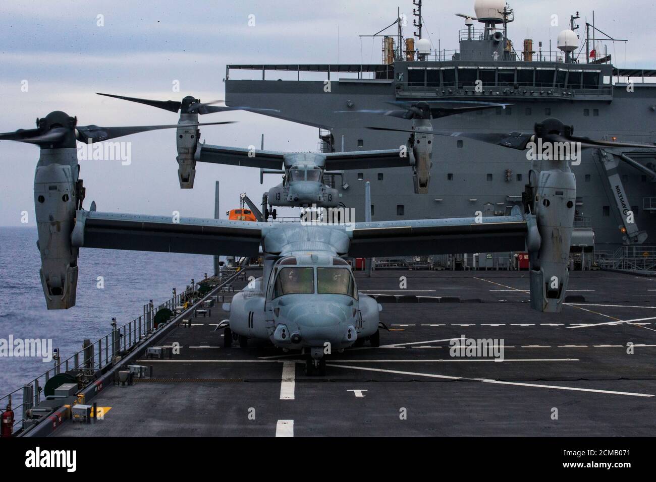 U.S. Marines with VMM-263 and Sailors aboard the Expeditionary Sea Base ...