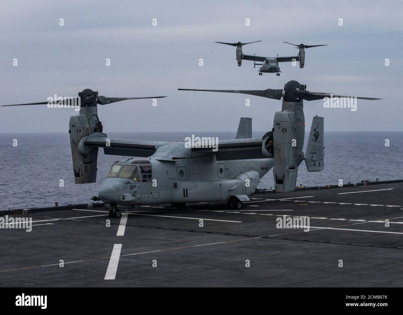U.S. Marines with VMM-263 and Sailors aboard the Expeditionary Sea Base ...