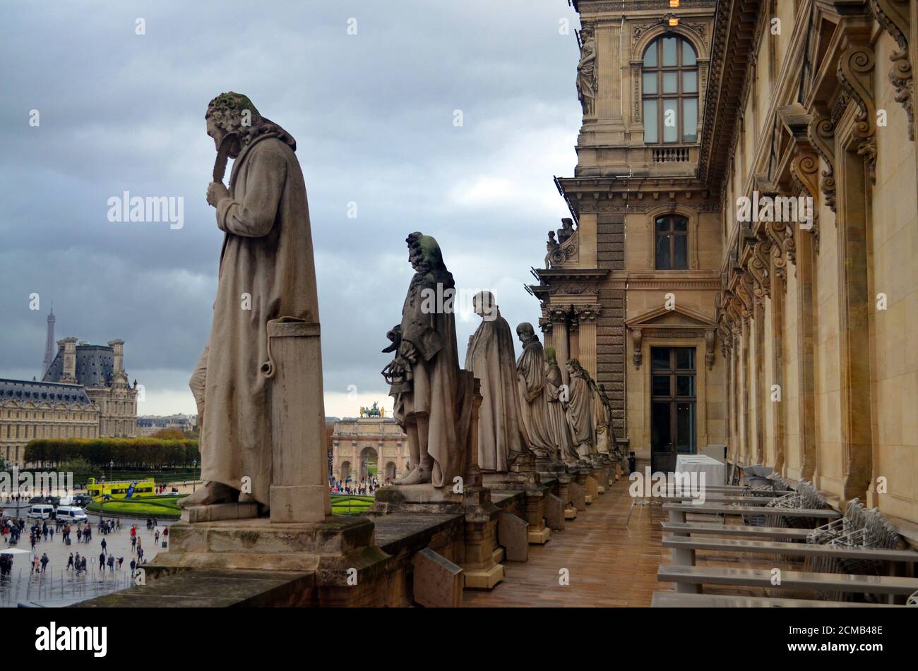 Paris, France - Le Louvre Balcony Statues Stock Photo - Alamy