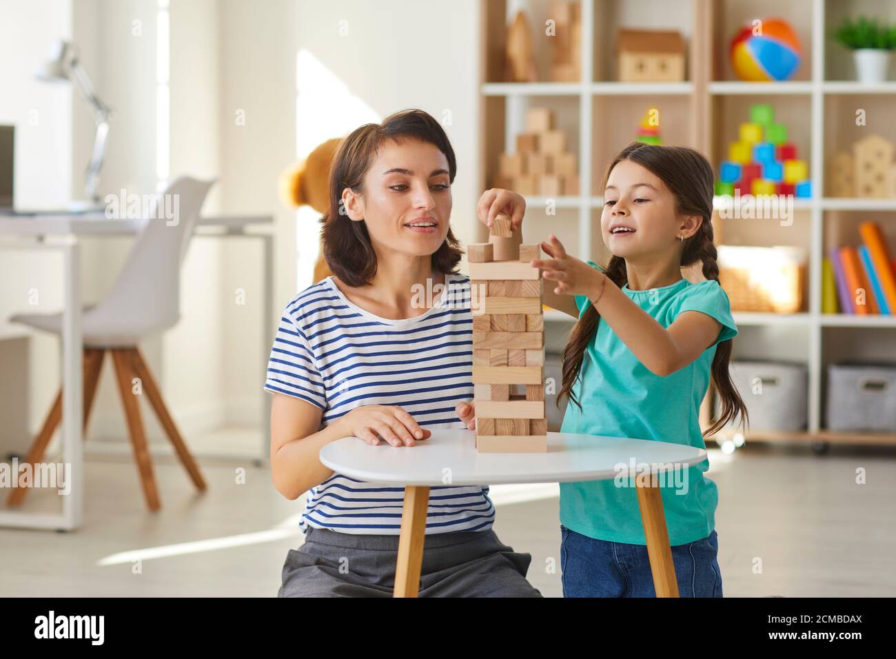 Child mom play together block hi-res stock photography and images - Alamy
