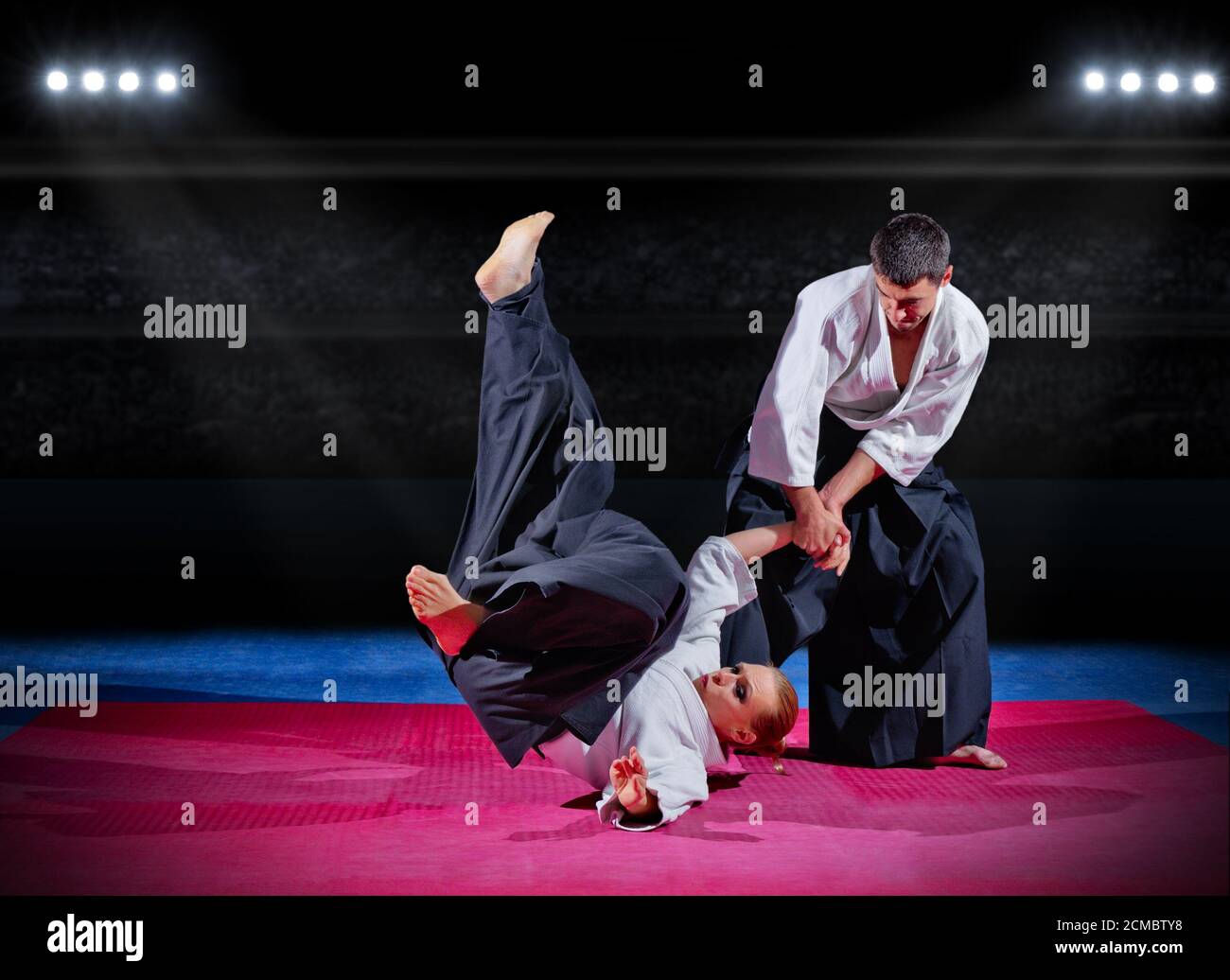 Fight between two martial arts fighters at sports hall Stock Photo - Alamy