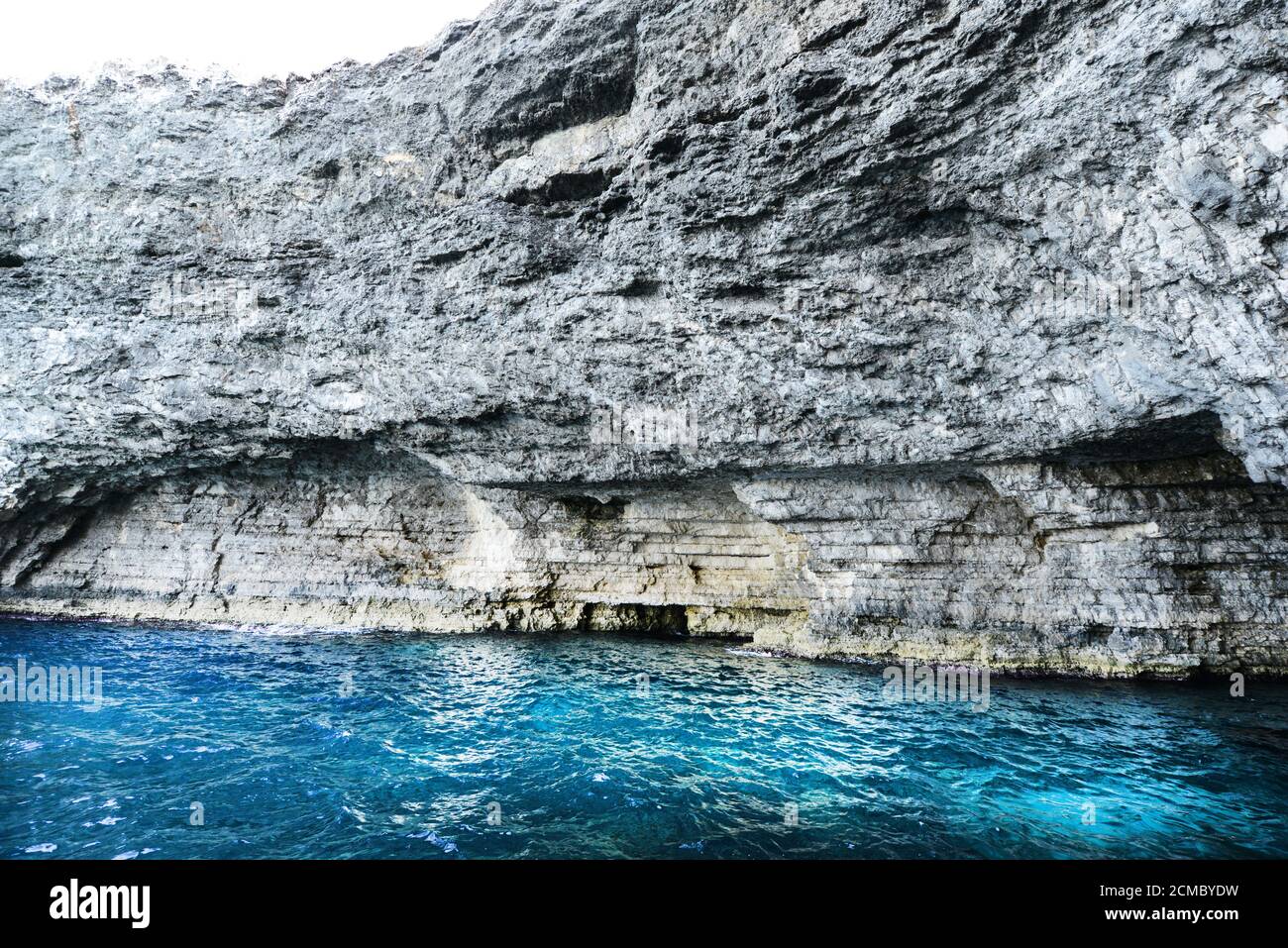 The rocky coastline around Santa Maria Caves in Comino, Malta Stock ...
