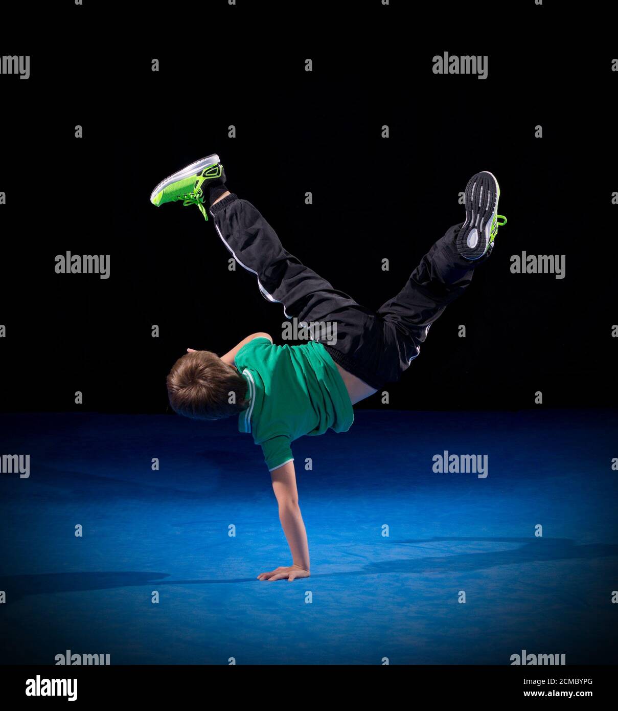 Little boy breakdancer on black Stock Photo - Alamy