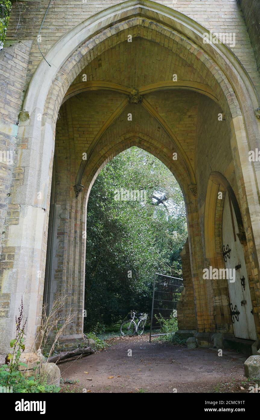 Pathway leading through an archway of a medieval chapel in the old ...