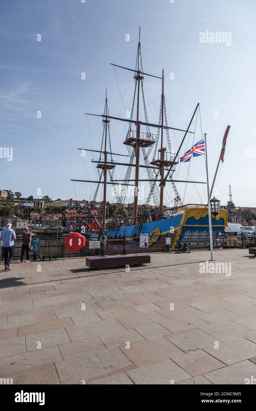 A replica of HMS Endeavour berthed at Whitby,North Yorkshire,England UK ...